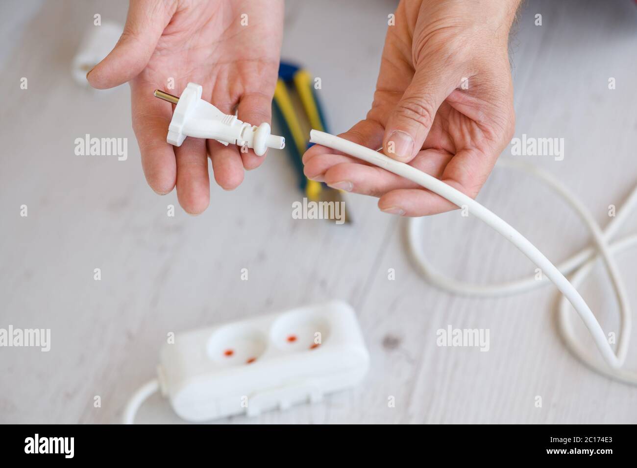Broken extension electric plug hi-res stock photography and images - Alamy