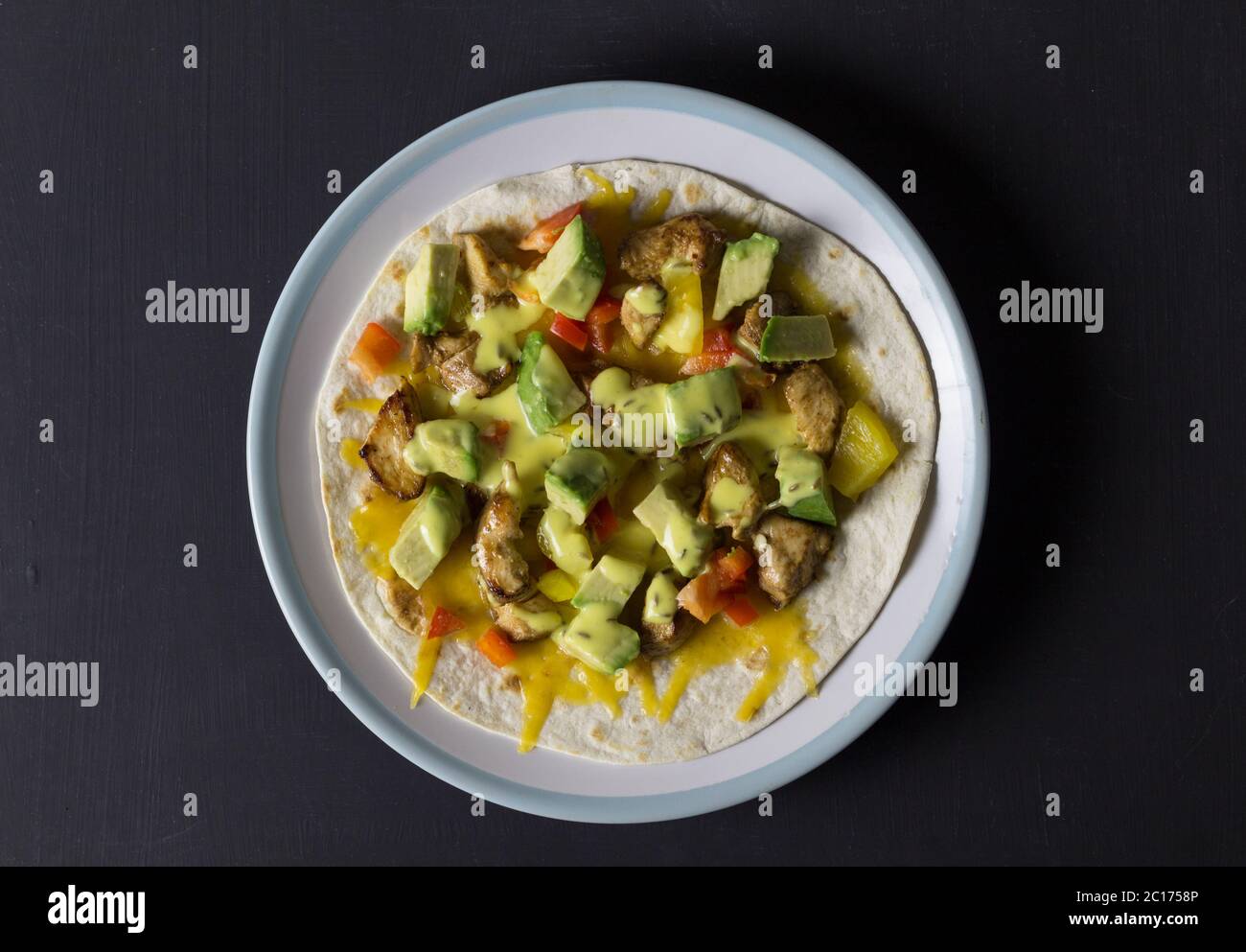 Chicken avocado peppers wrap hi-res stock photography and images - Alamy