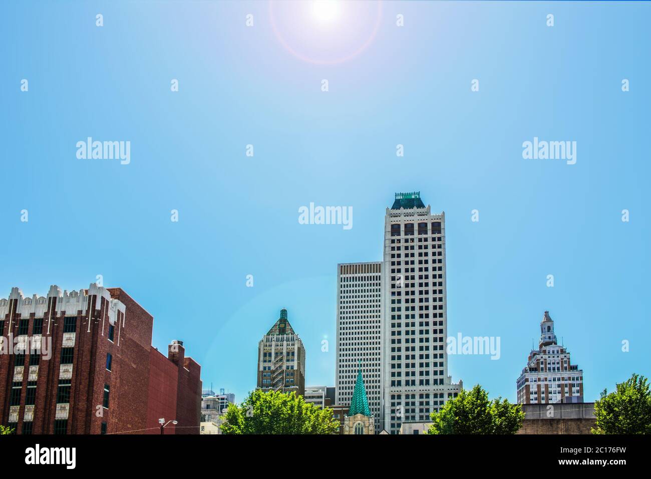 Art Deco and modern buildings skyline of Tulsa OK USA with lens flare ...