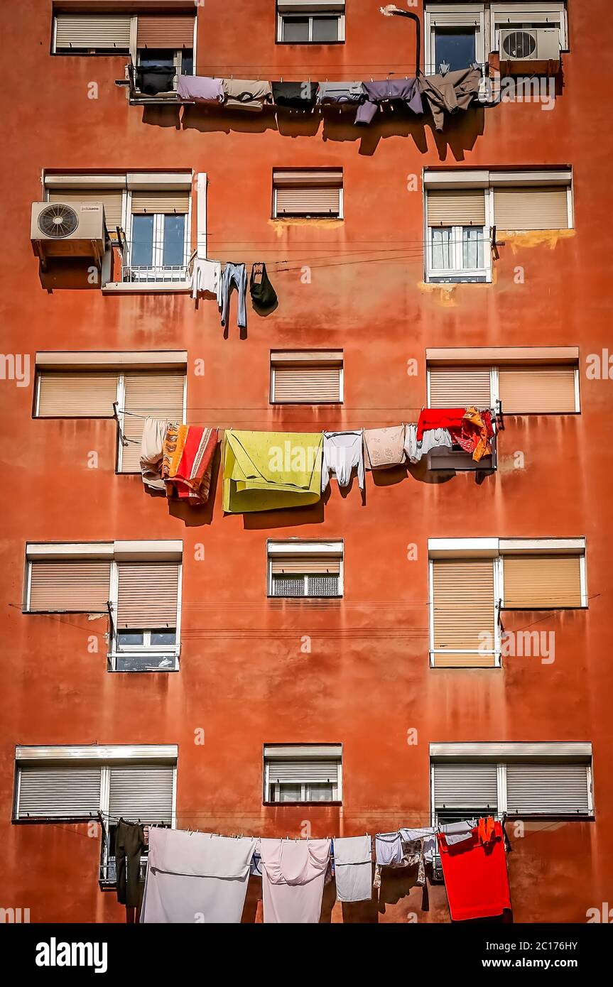 Laundry drying outside residential building Stock Photo - Alamy