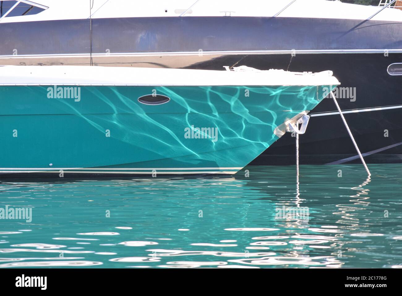 Water reflections on bow of a boat Stock Photo - Alamy