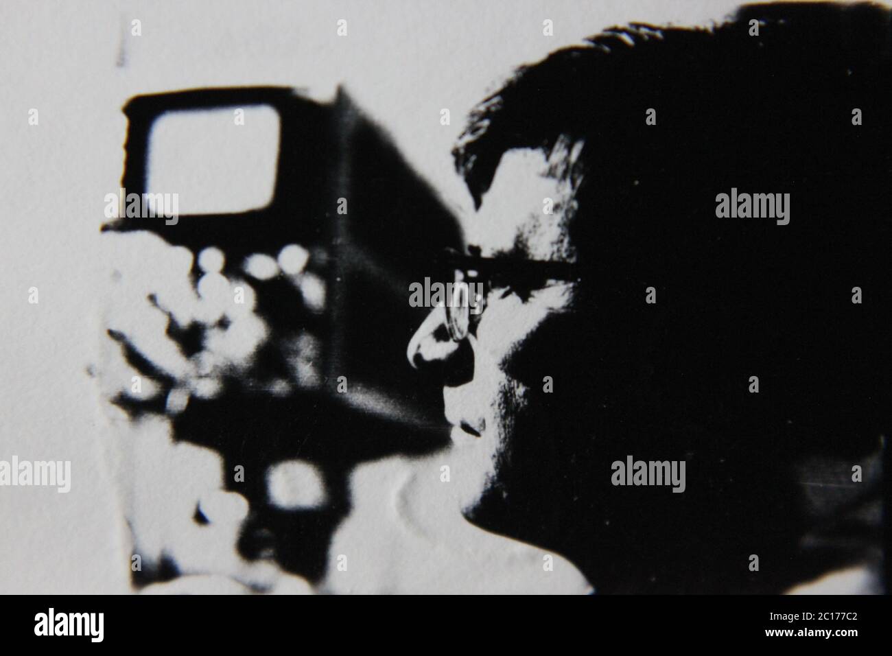 Fine 70s vintage black and white extreme photography of a man watching ...