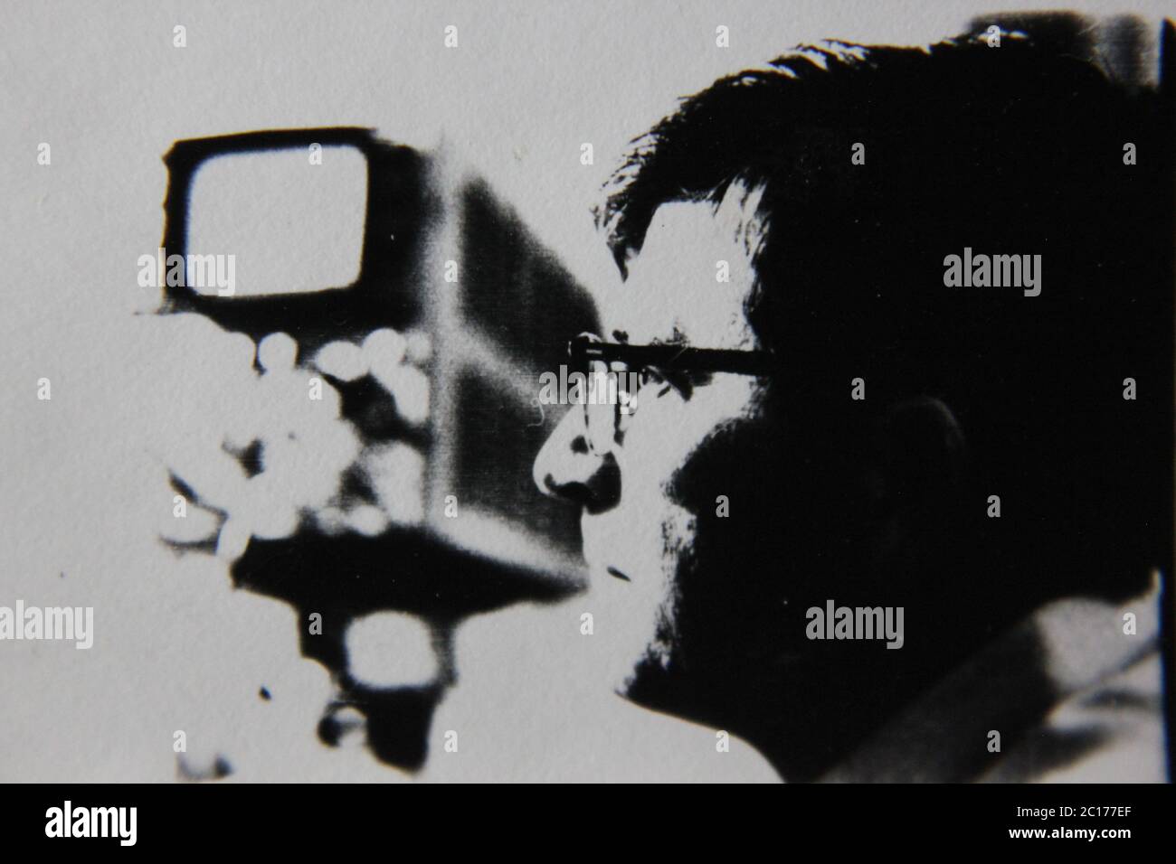 Fine 70s vintage black and white extreme photography of a man watching ...