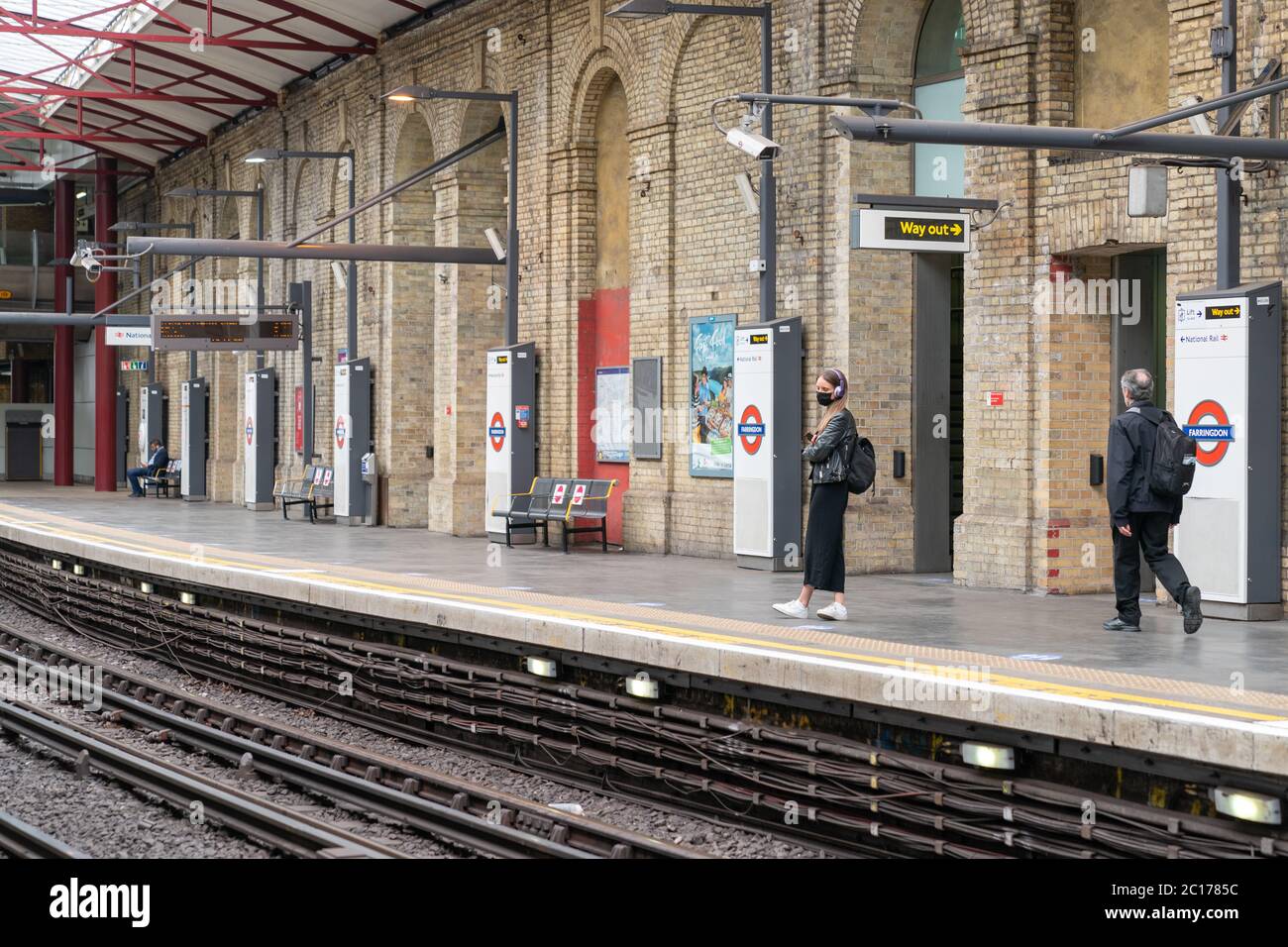 LONDON, ENGLAND - JUNE 8, 2020: Young woman on a London Underground ...