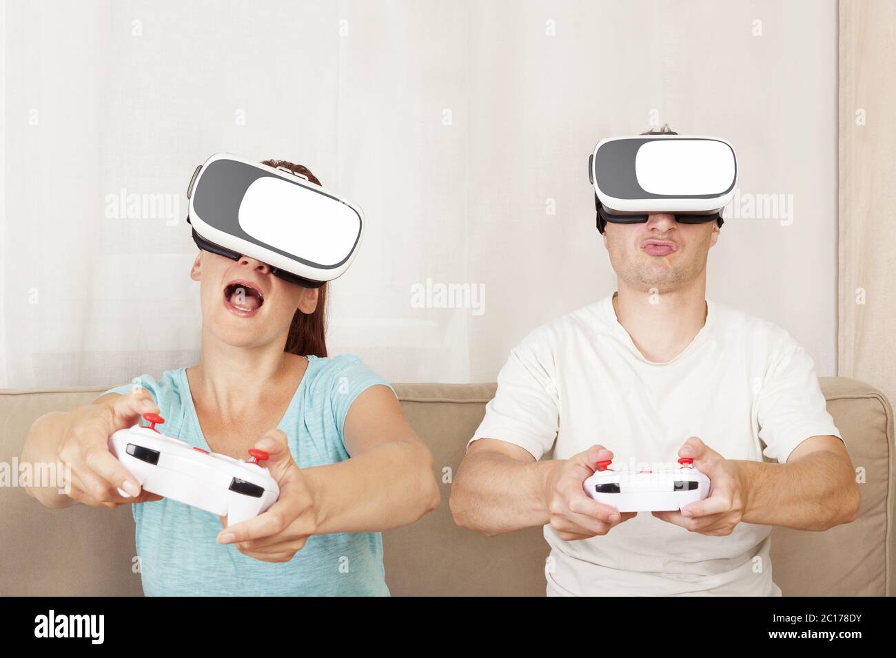 Couple playing virtual reality Stock Photo - Alamy