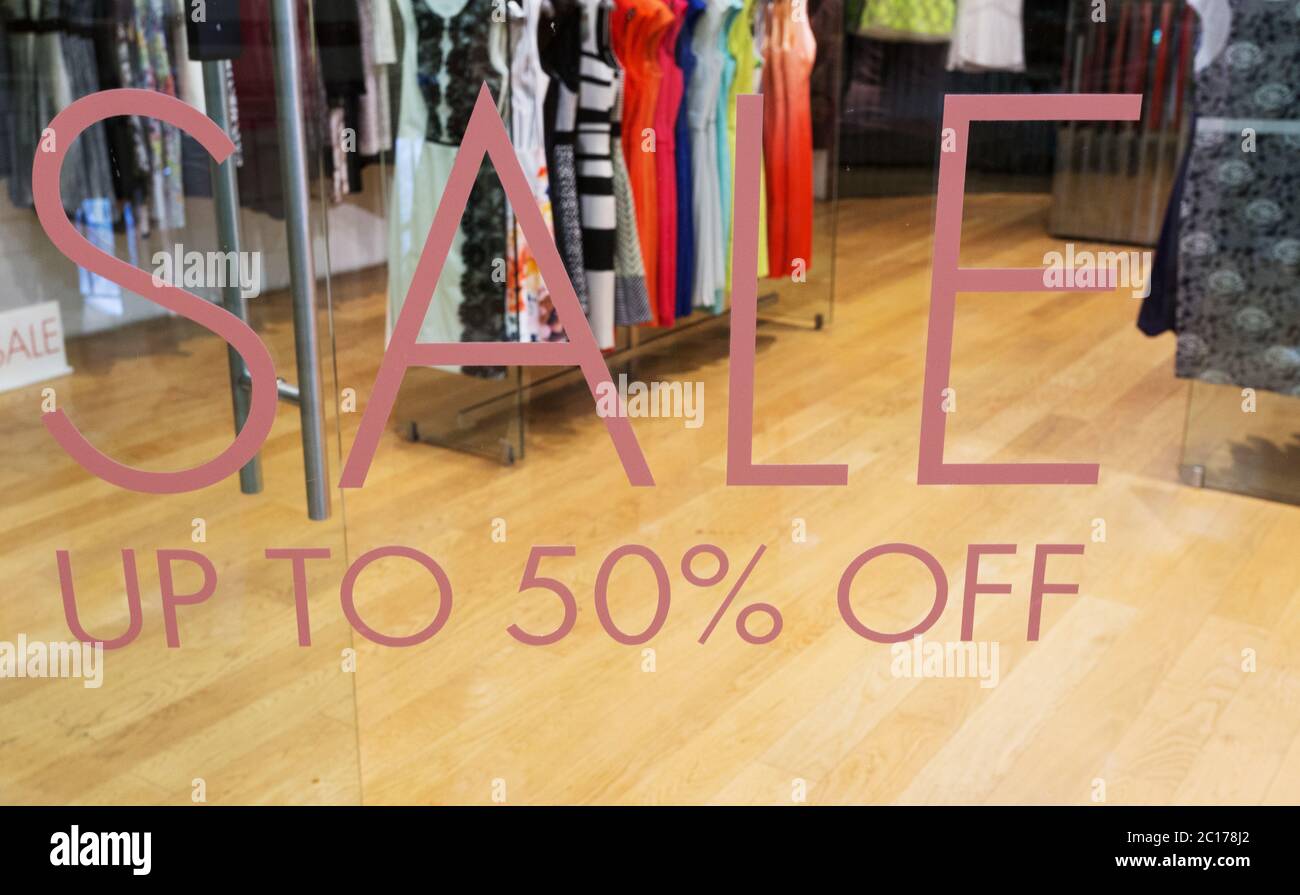 sign of sale on display window Stock Photo - Alamy