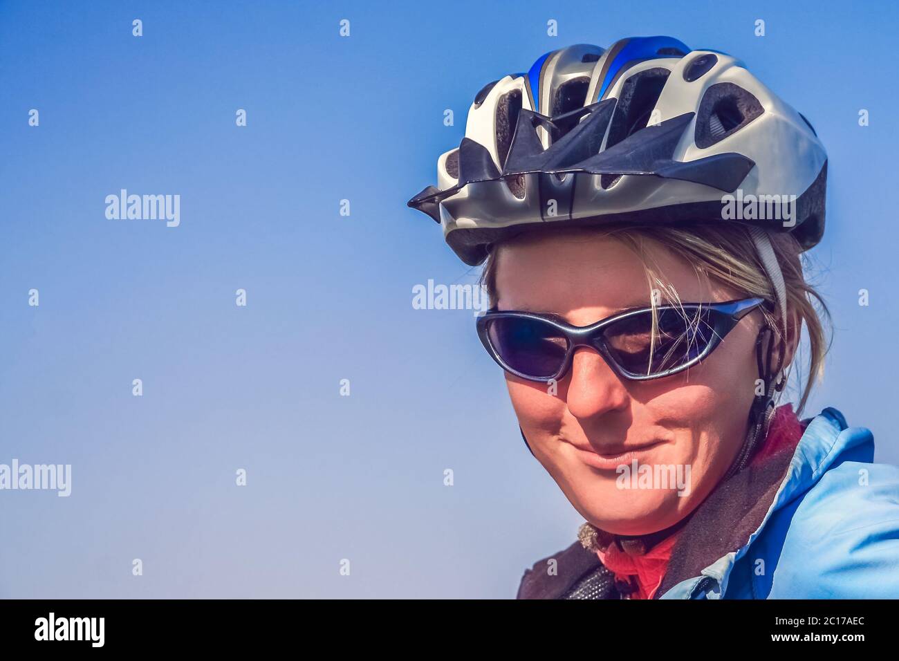 Cyclist face girl smiling hi-res stock photography and images - Alamy