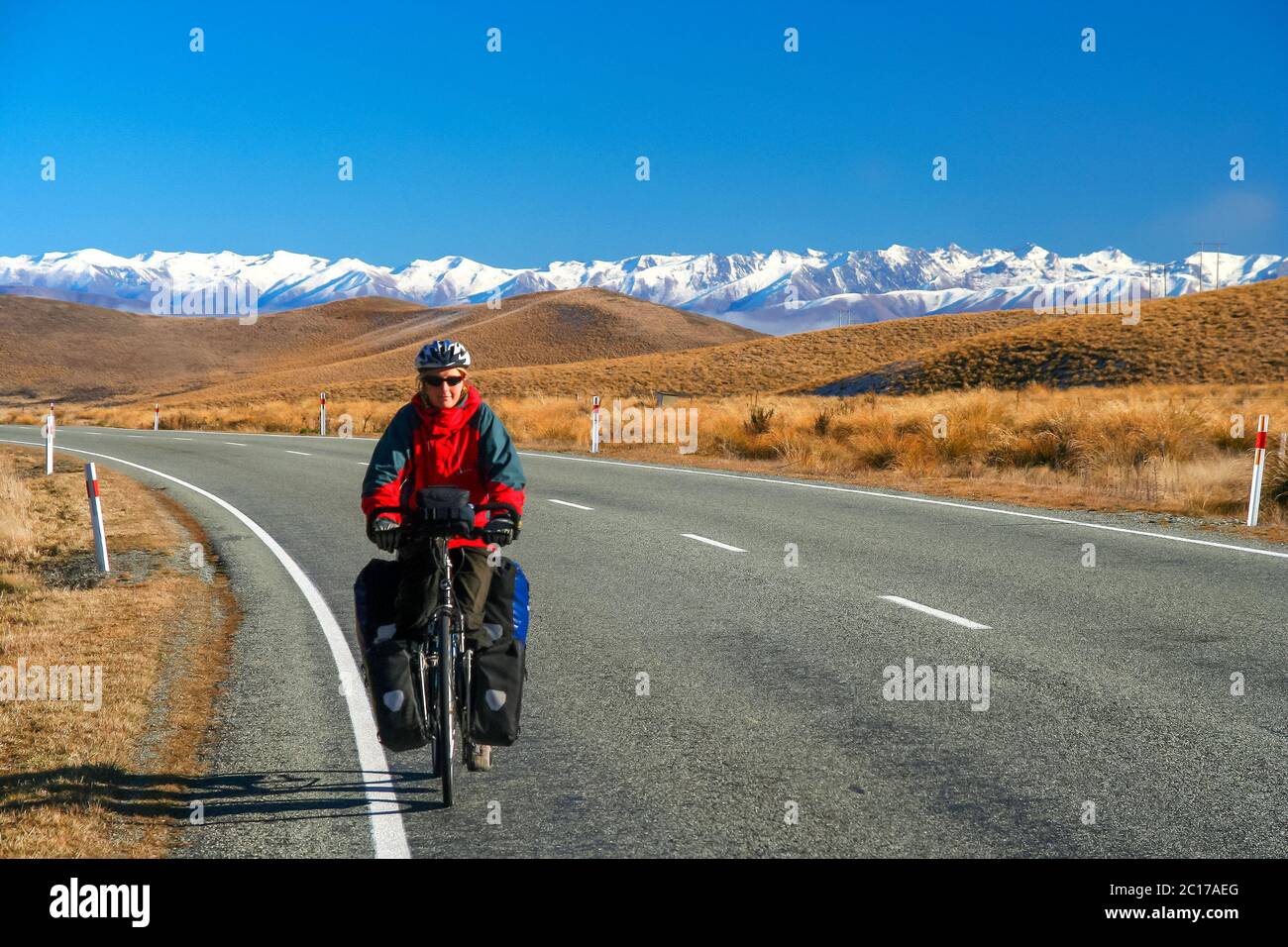 Woman and road cycle new zealand hi-res stock photography and images ...