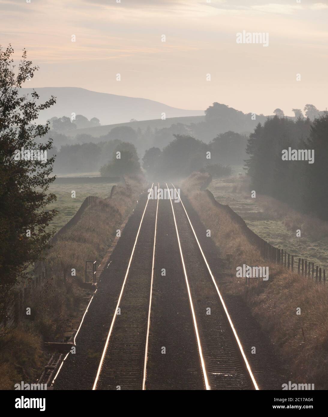Two track Netowrk Rail rural railway line at Eldroth, Yorkshire with ...