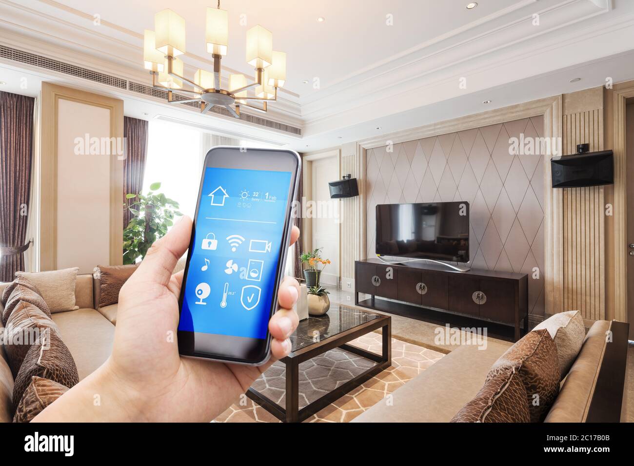 mobile phone in smart home Stock Photo - Alamy