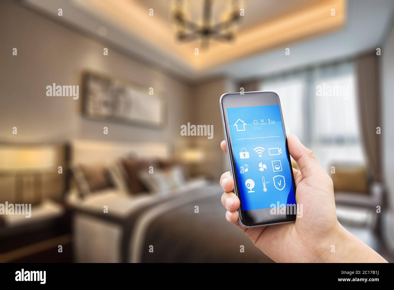 mobile phone in smart home Stock Photo - Alamy