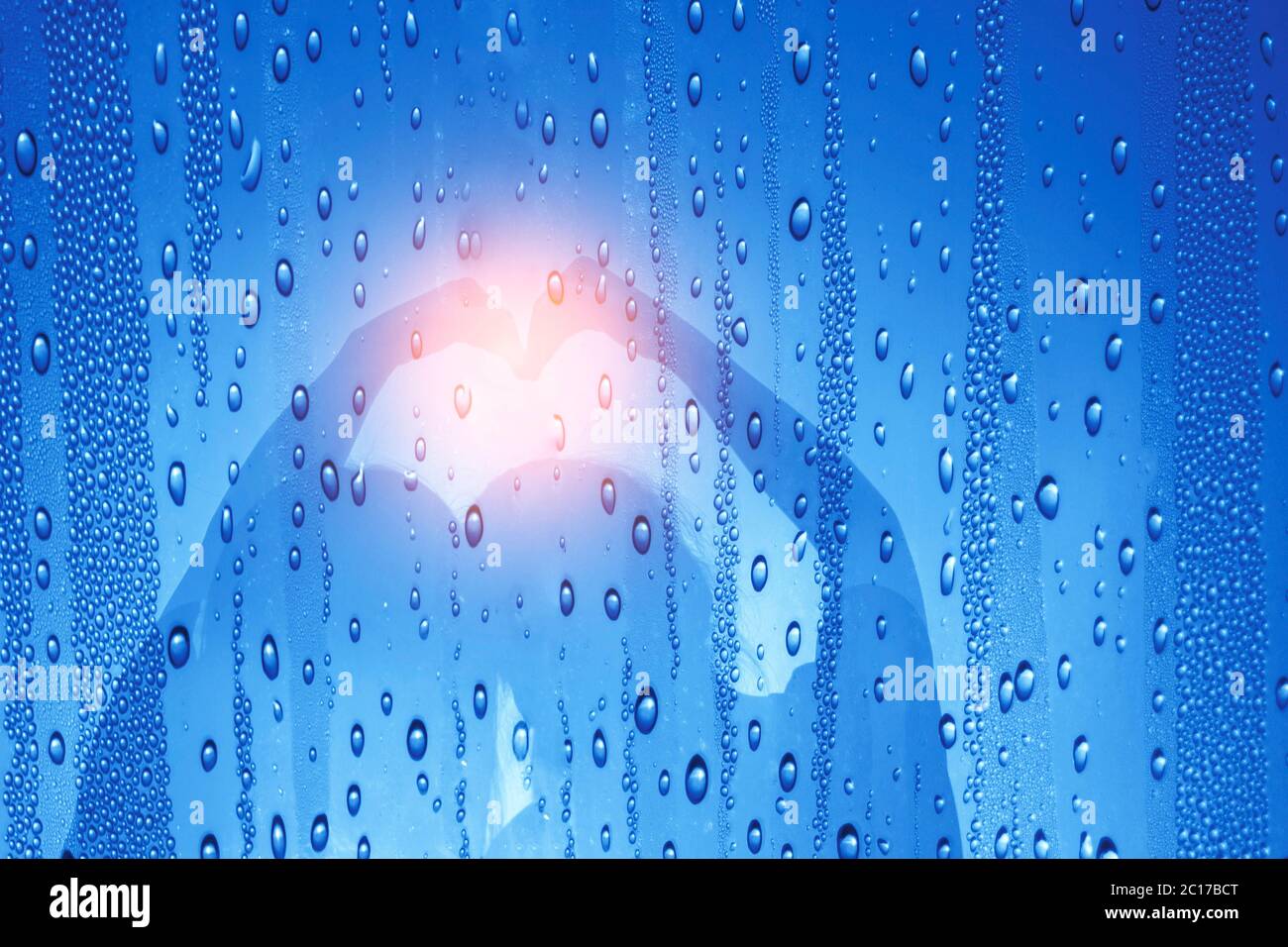 Water drops with girl behind Stock Photo - Alamy