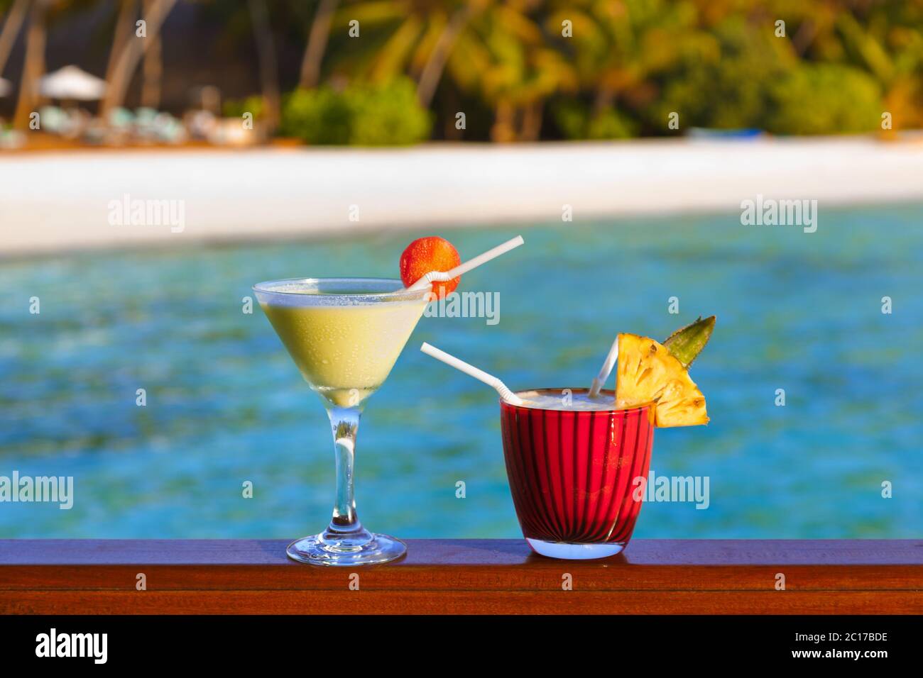Fruit cocktail on Maldives beach Stock Photo - Alamy