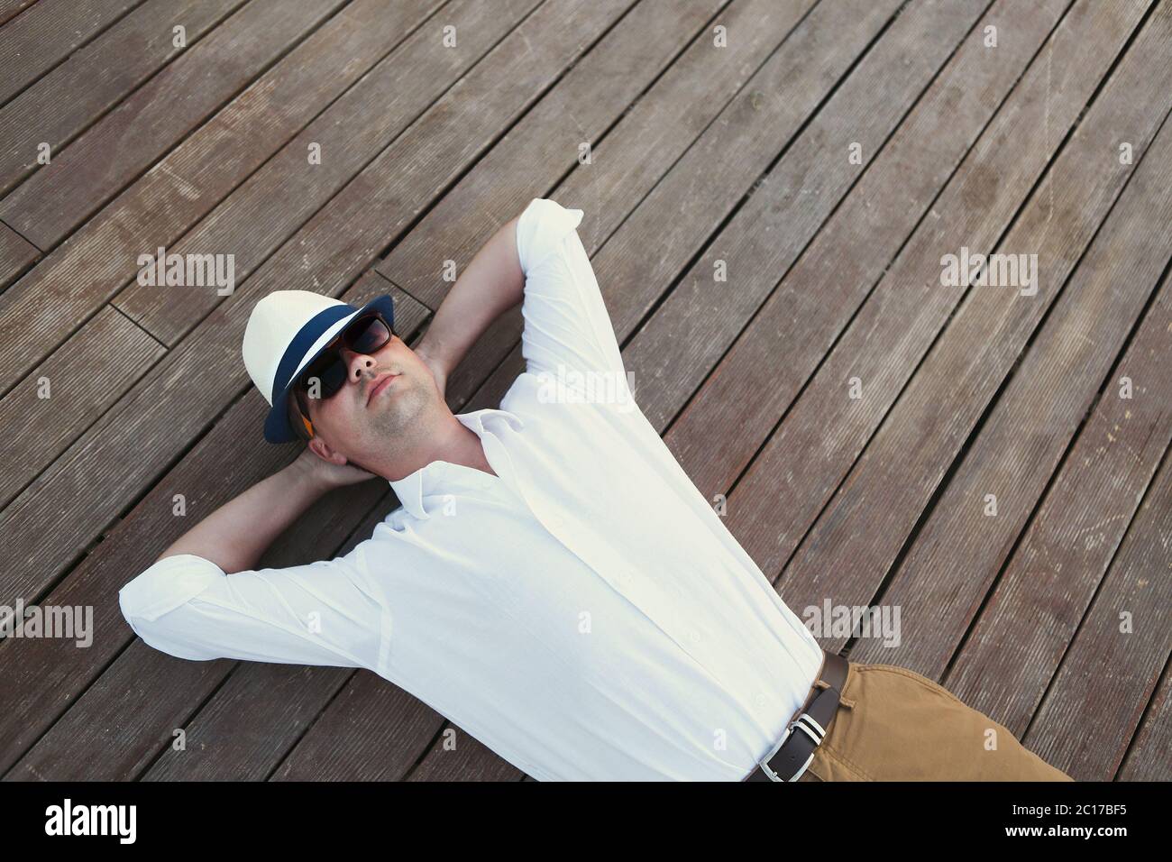 Man lying floor side hi-res stock photography and images - Alamy