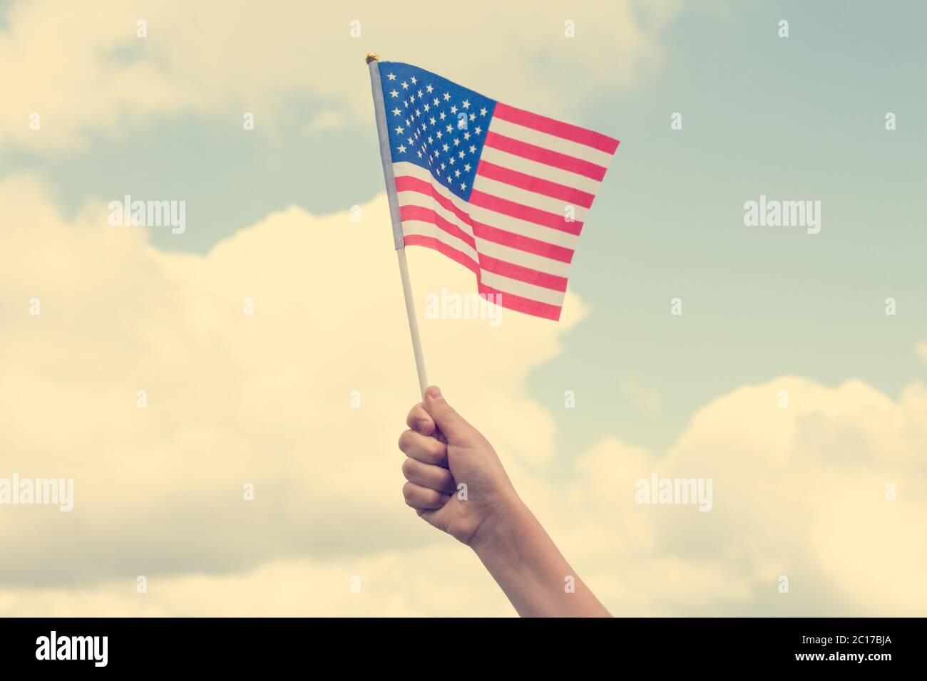 Kid hand american flag hi-res stock photography and images - Alamy