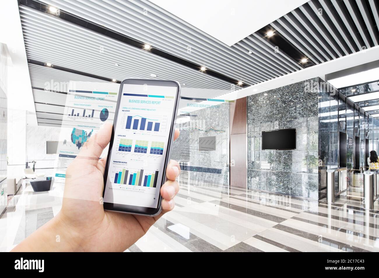 mobile phone with mobile office in modern hall Stock Photo - Alamy