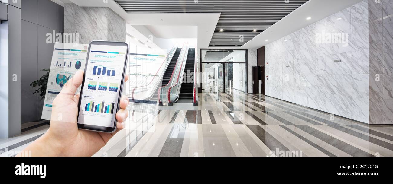 mobile phone with mobile office in modern hall Stock Photo - Alamy
