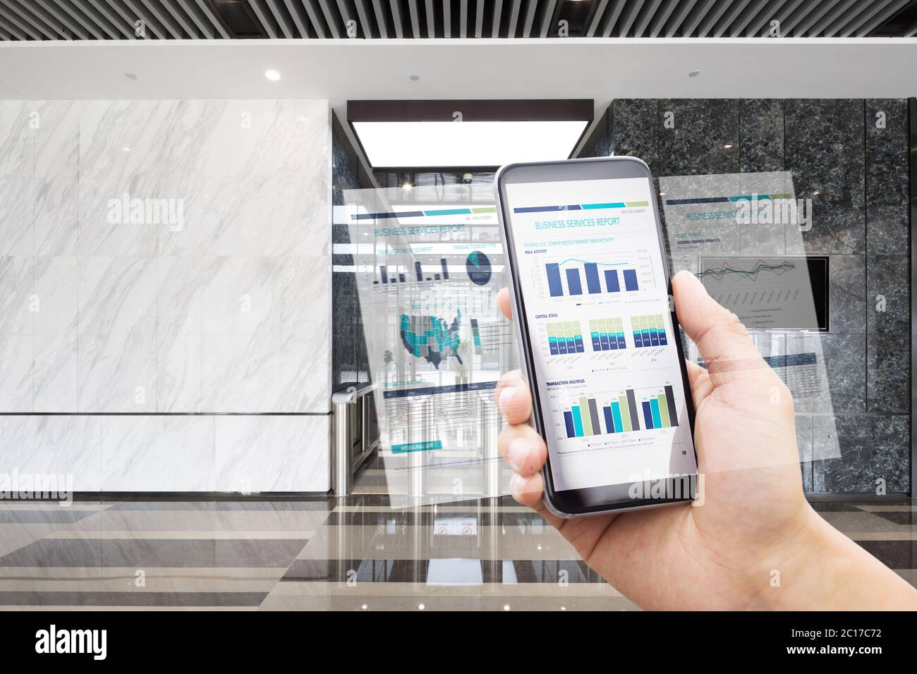 mobile phone with mobile office in modern hall Stock Photo - Alamy