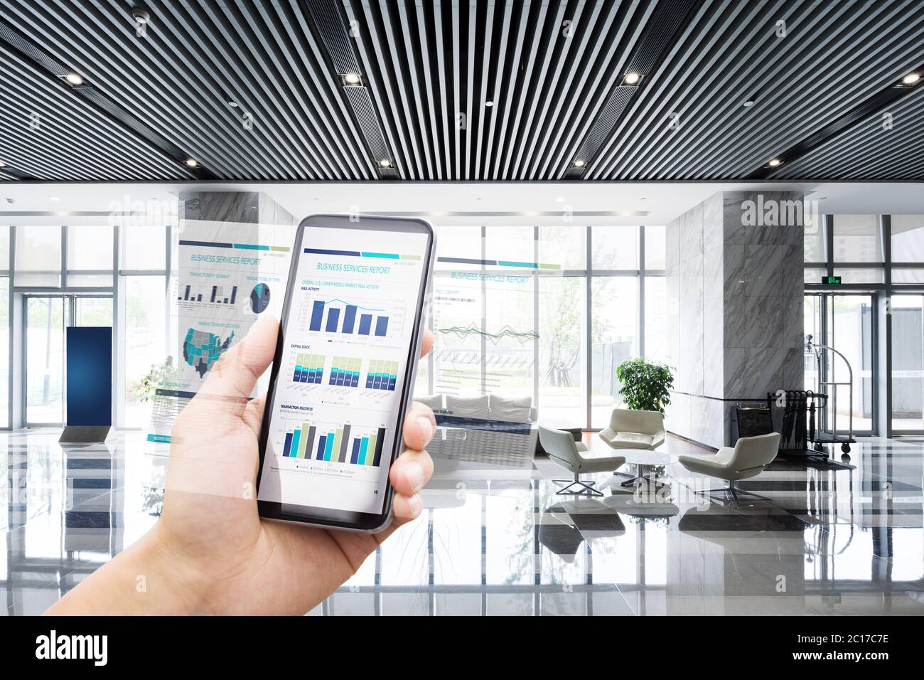 mobile phone with mobile office in modern hall Stock Photo - Alamy