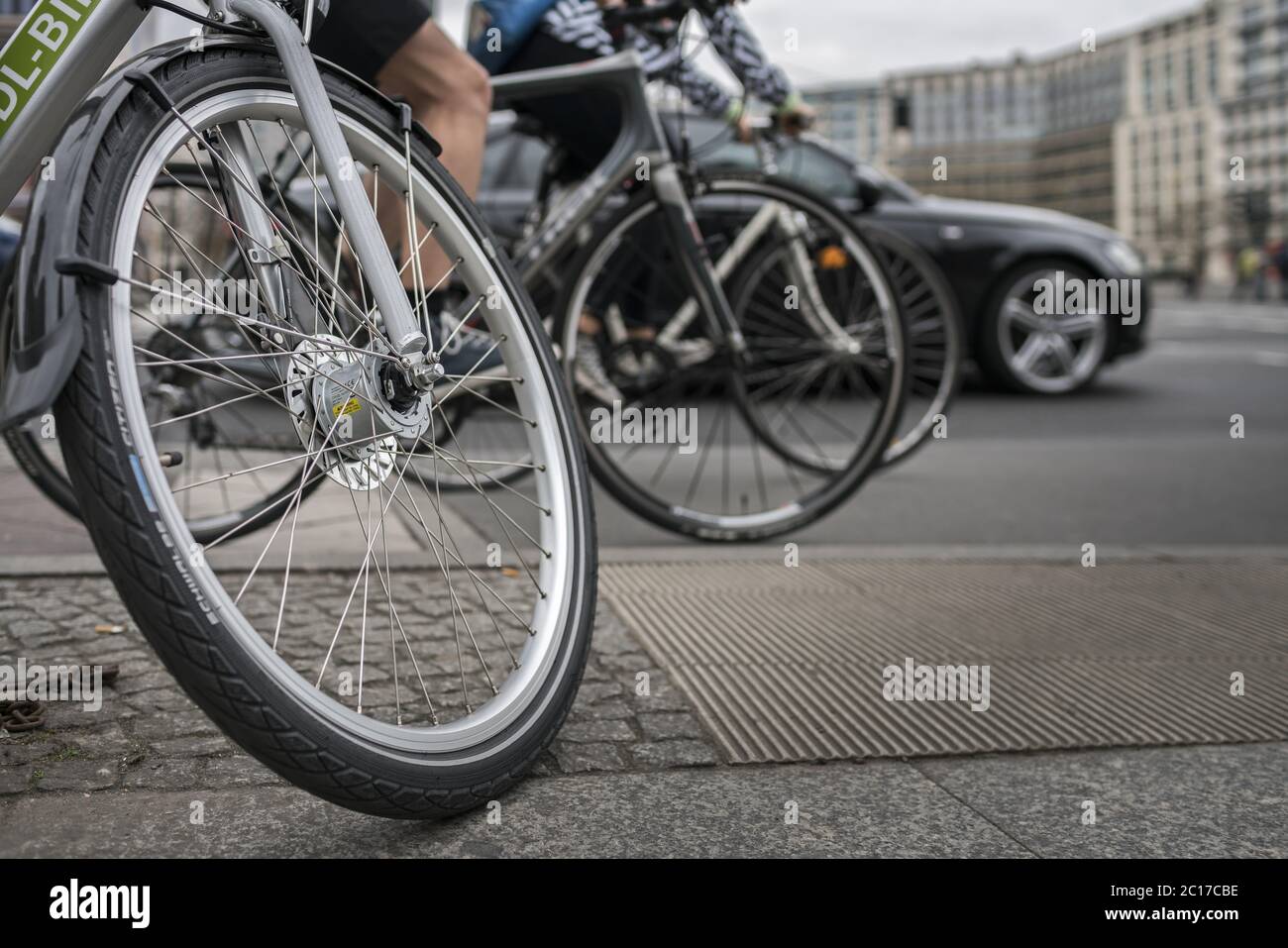Bicycle in road traffic Stock Photo - Alamy