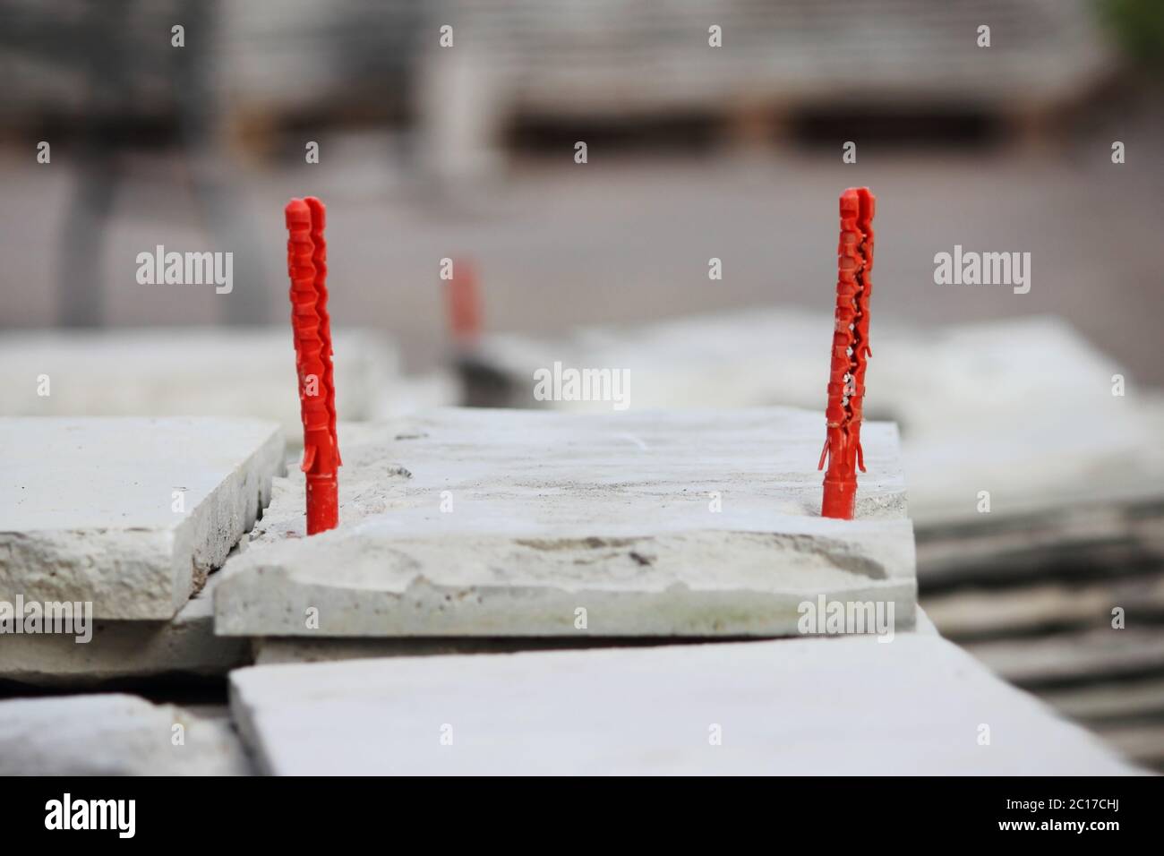 The old tile with two red dowels removed from the walls of the cinema ...