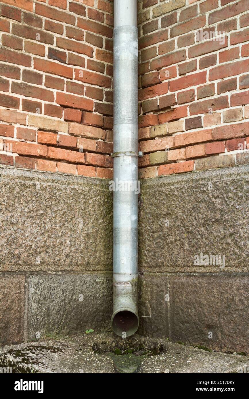 Vintage brick wall with drainpipe Stock Photo - Alamy