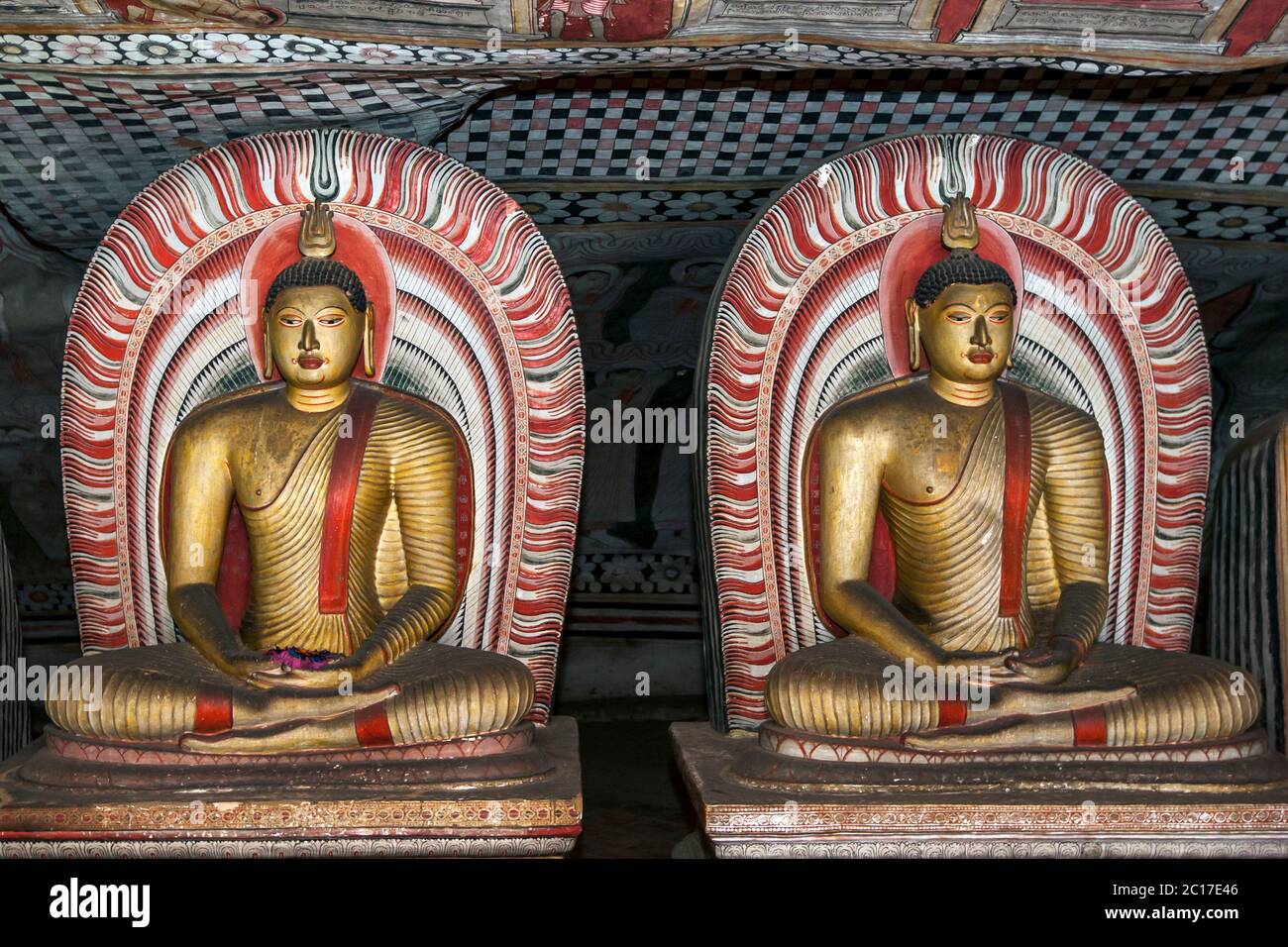 Seated Buddha statues in Cave Two (Maharaja Viharaya) at the Dambulla Cave Temples in central ...