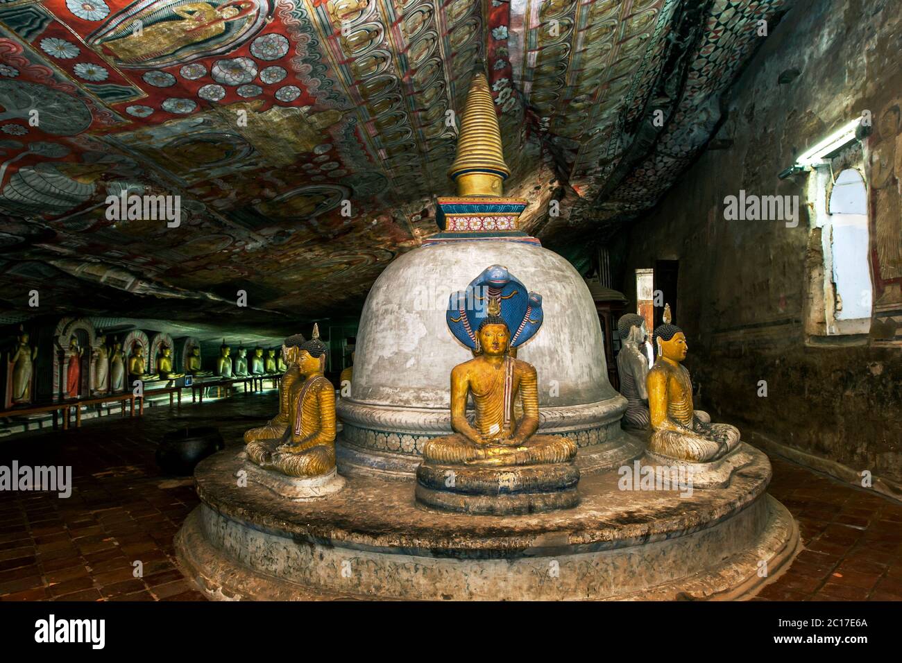 The Buddhist dagoba located inside Cave Two (Maharaja Viharaya) at the Dambulla Cave Temples in ...