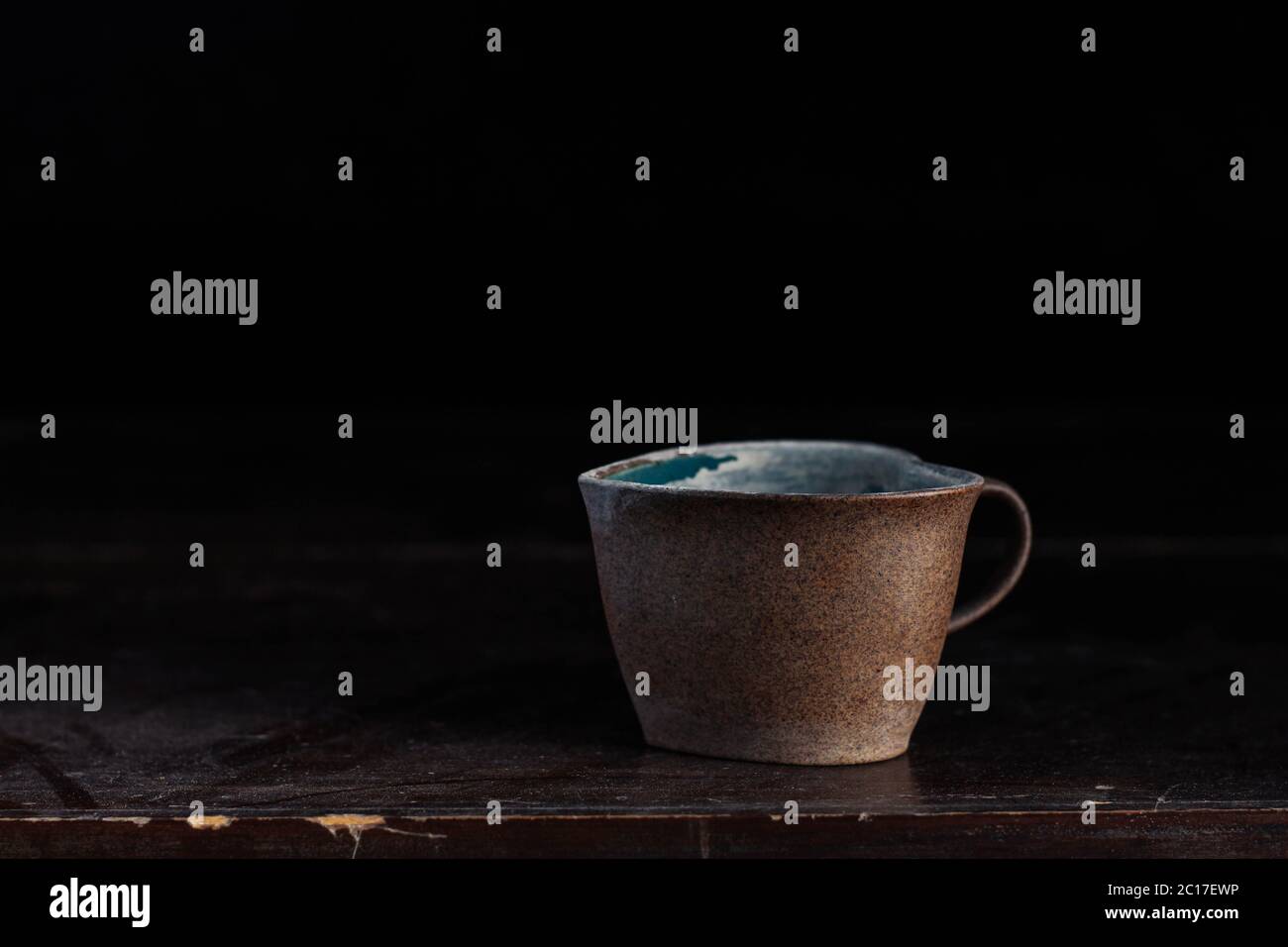 cups and dusty on wooden Stock Photo - Alamy