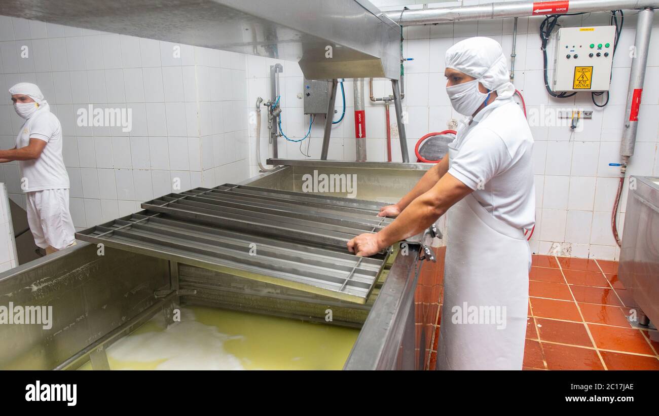 Zuleta, Imbabura / Ecuador - November 9 2018: Workers compacting the ...