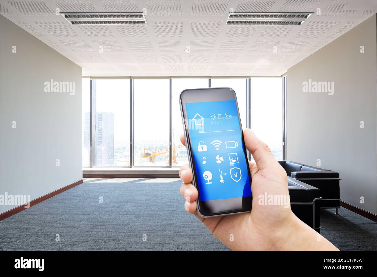 mobile phone in modern lobby Stock Photo - Alamy