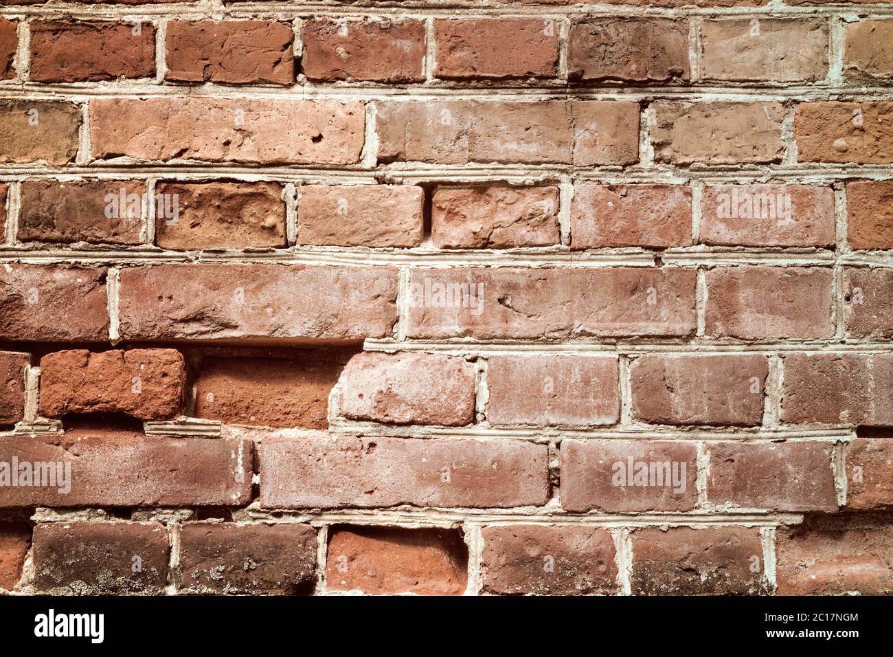 Old uneven brick wall Stock Photo - Alamy
