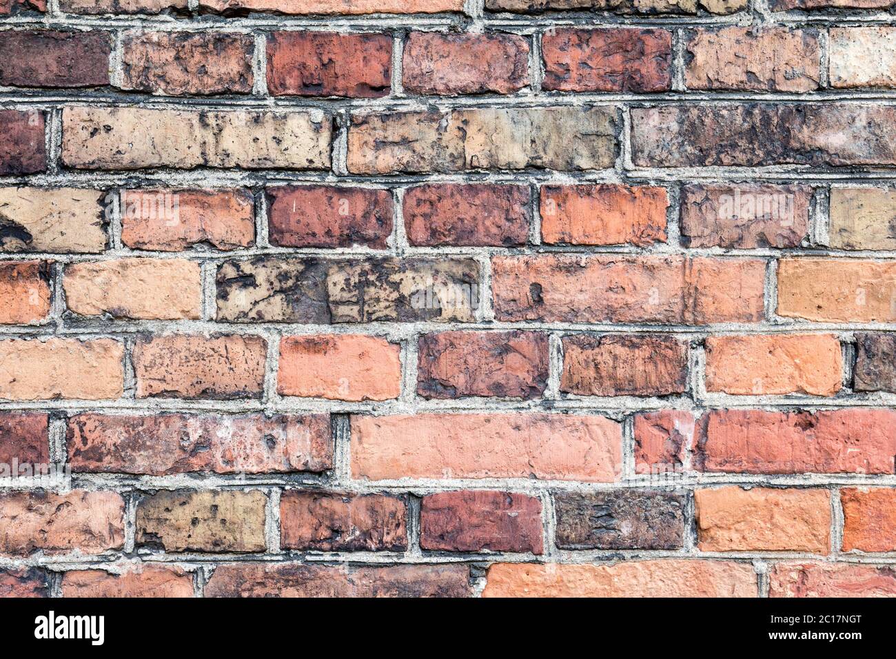 Messy old brick wall background Stock Photo - Alamy