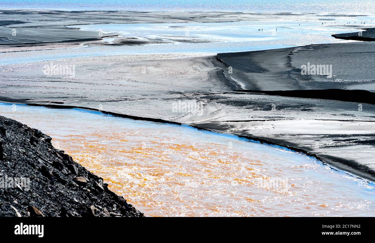 Production waste is accumulated in water Stock Photo - Alamy