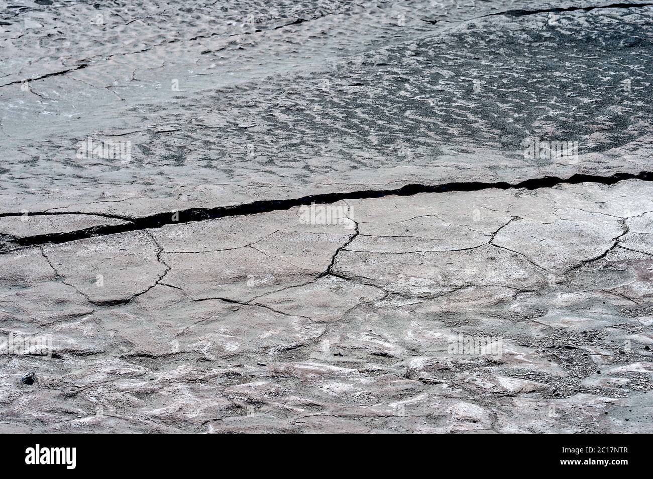Cracks on the surface of dry land Stock Photo - Alamy