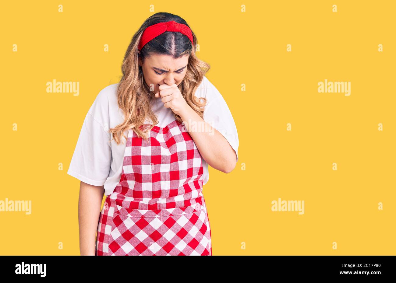 Woman wearing apron feeling unwell hi-res stock photography and images ...