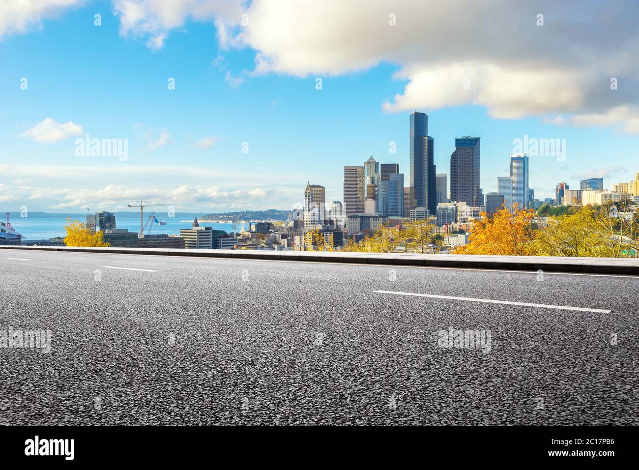 empty road with cityscape of modern city Stock Photo - Alamy