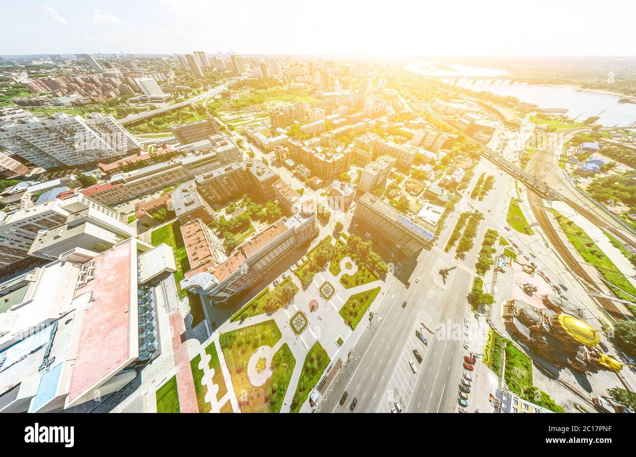 Aerial city view with crossroads and roads, houses, buildings, parks ...