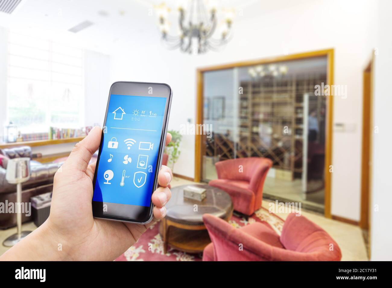 mobile phone in modern living room Stock Photo - Alamy