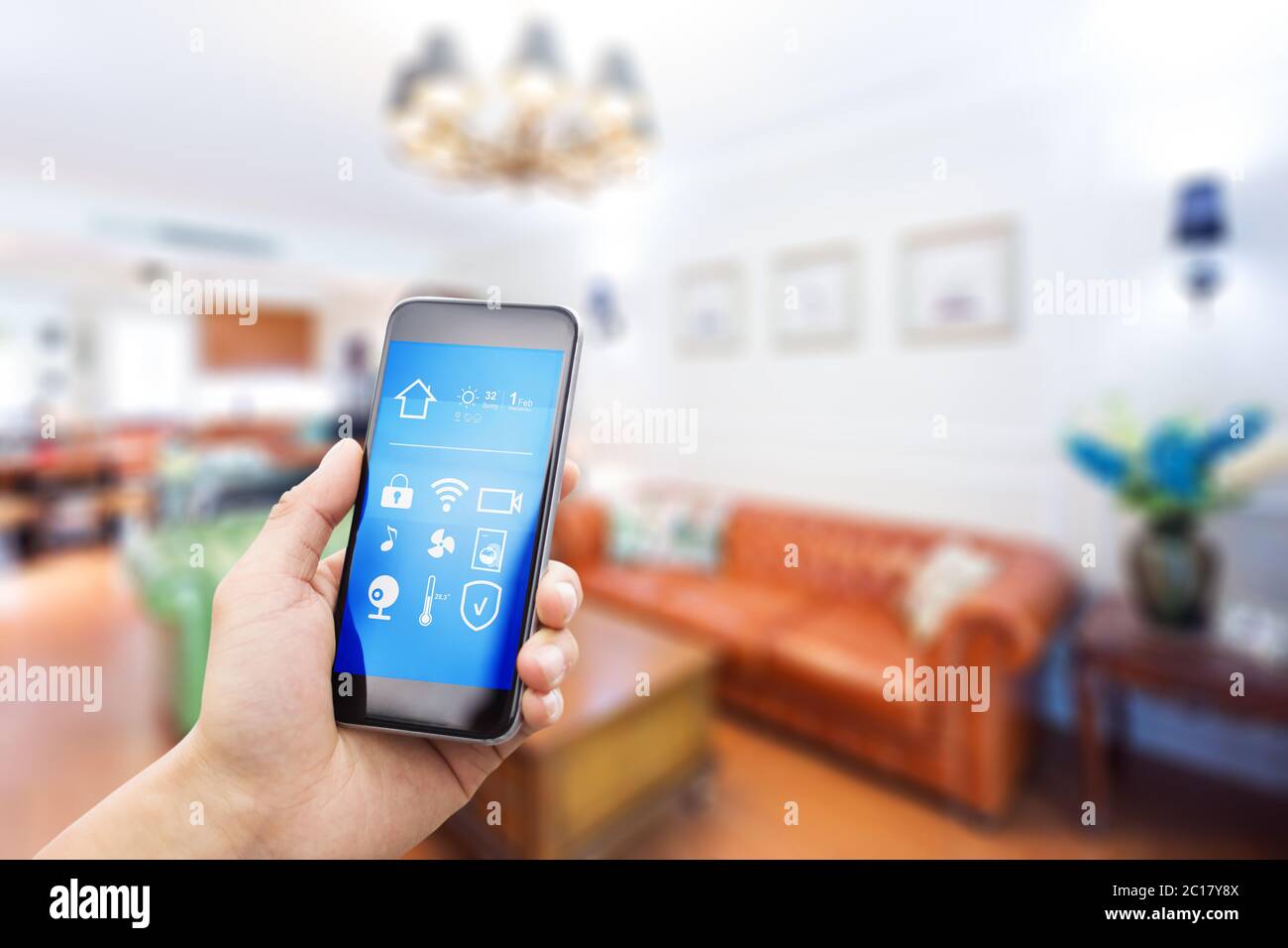 mobile phone in modern living room Stock Photo - Alamy