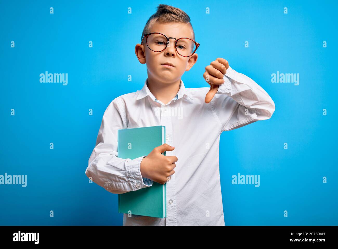 Young little caucasian student kid wearing smart glasses and holding a ...