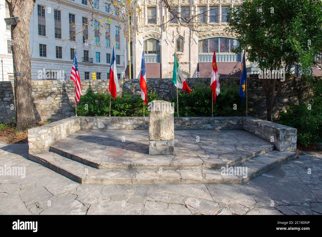 The Alamo Mission flags monument in downtown San Antonio, Texas, USA ...