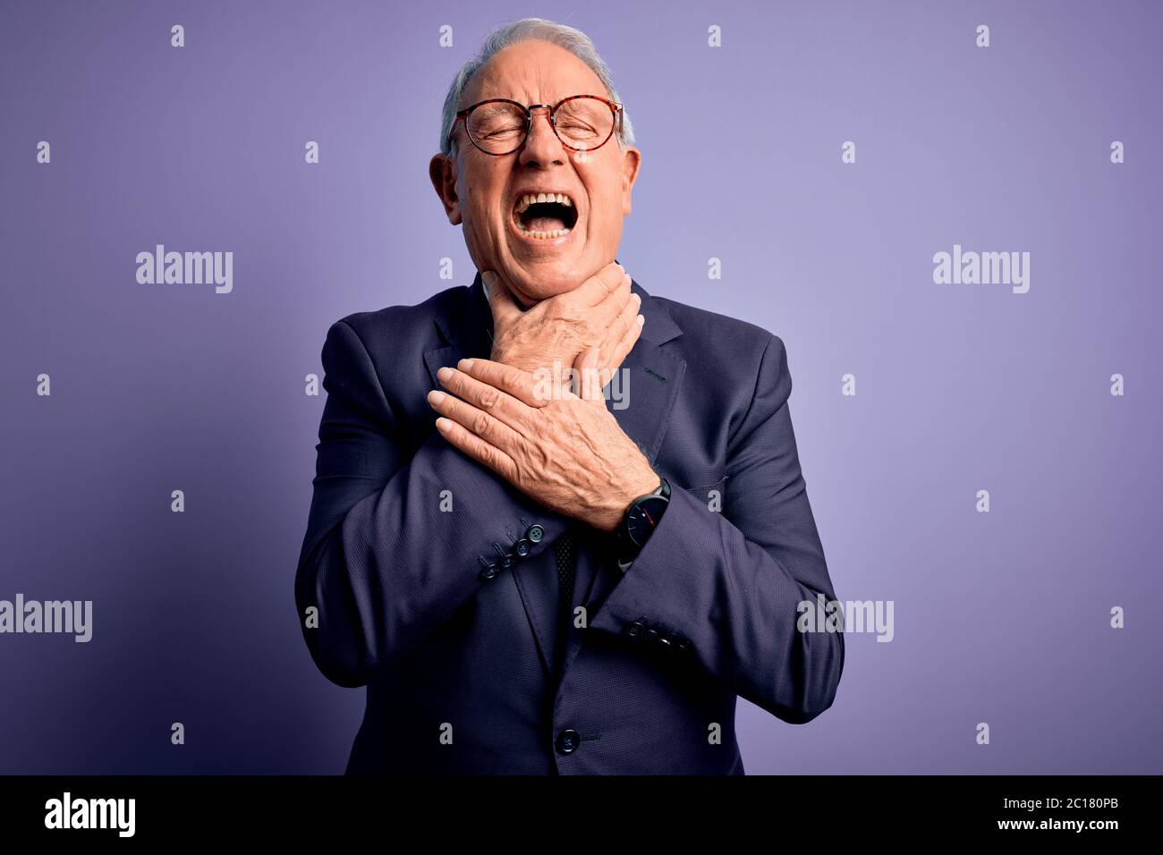 Grey haired senior business man wearing glasses and elegant suit and ...