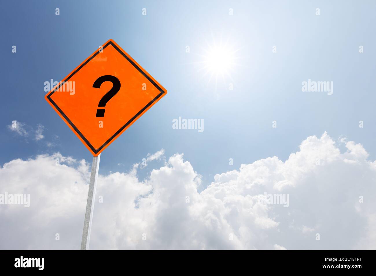orange diamond sign with question mark against blue sunny sky Stock ...