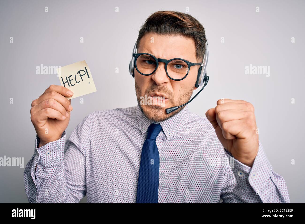 Young call center operator business man with blue eyes offering support ...