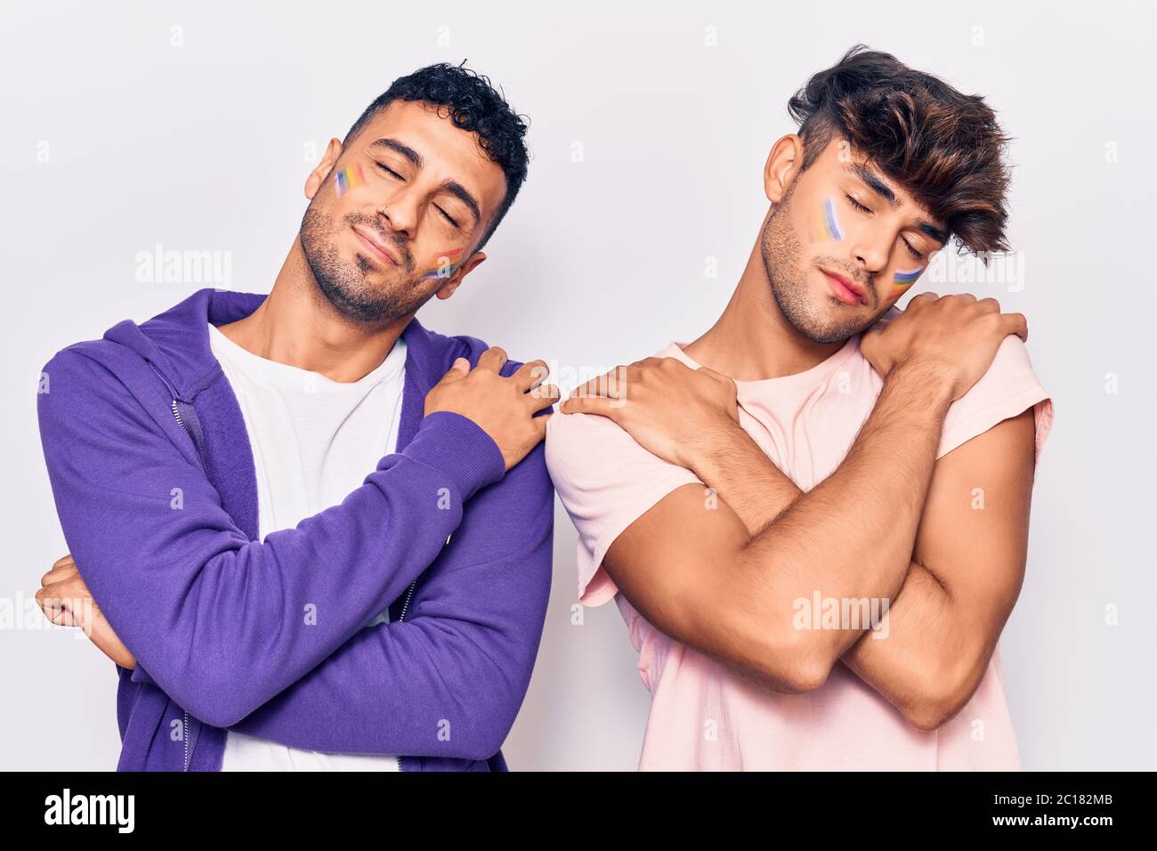 Happy gay couple cuddling on hi-res stock photography and images - Alamy