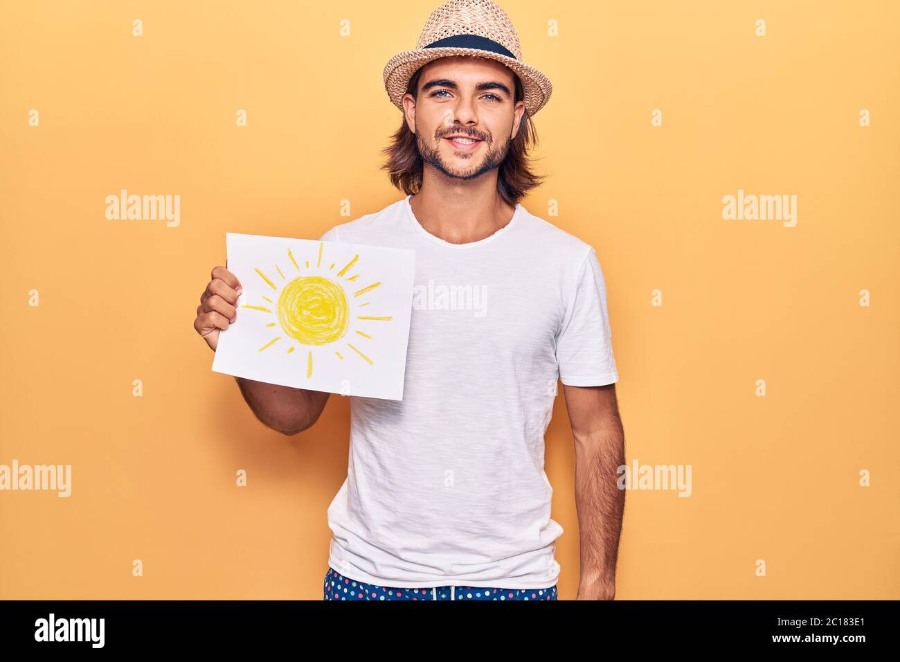 Young Handsome Man Holding Sun Draw Looking Positive And Happy Standing