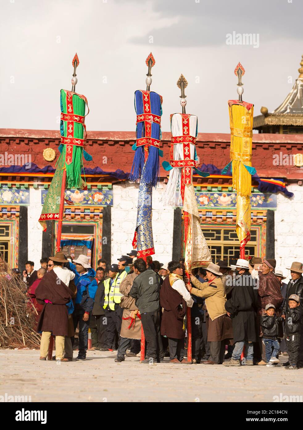 Peasants prepare for parading four victory banners, one withe the color ...