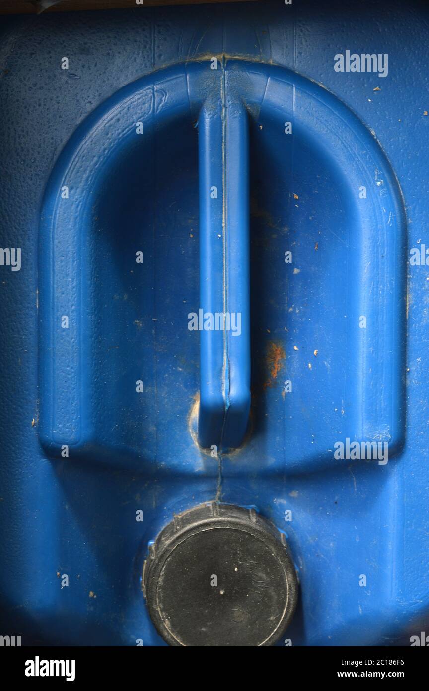 old used plastic cans Stock Photo - Alamy