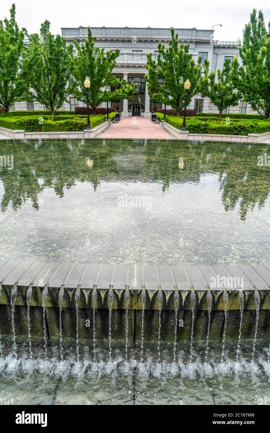 Water fountain with pool against building and trees in Salt Lake City ...